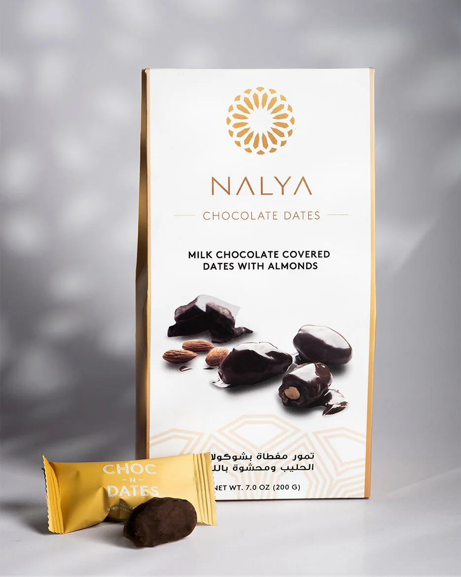 Milk chocolate covered dates with almonds — Nakheel Alya