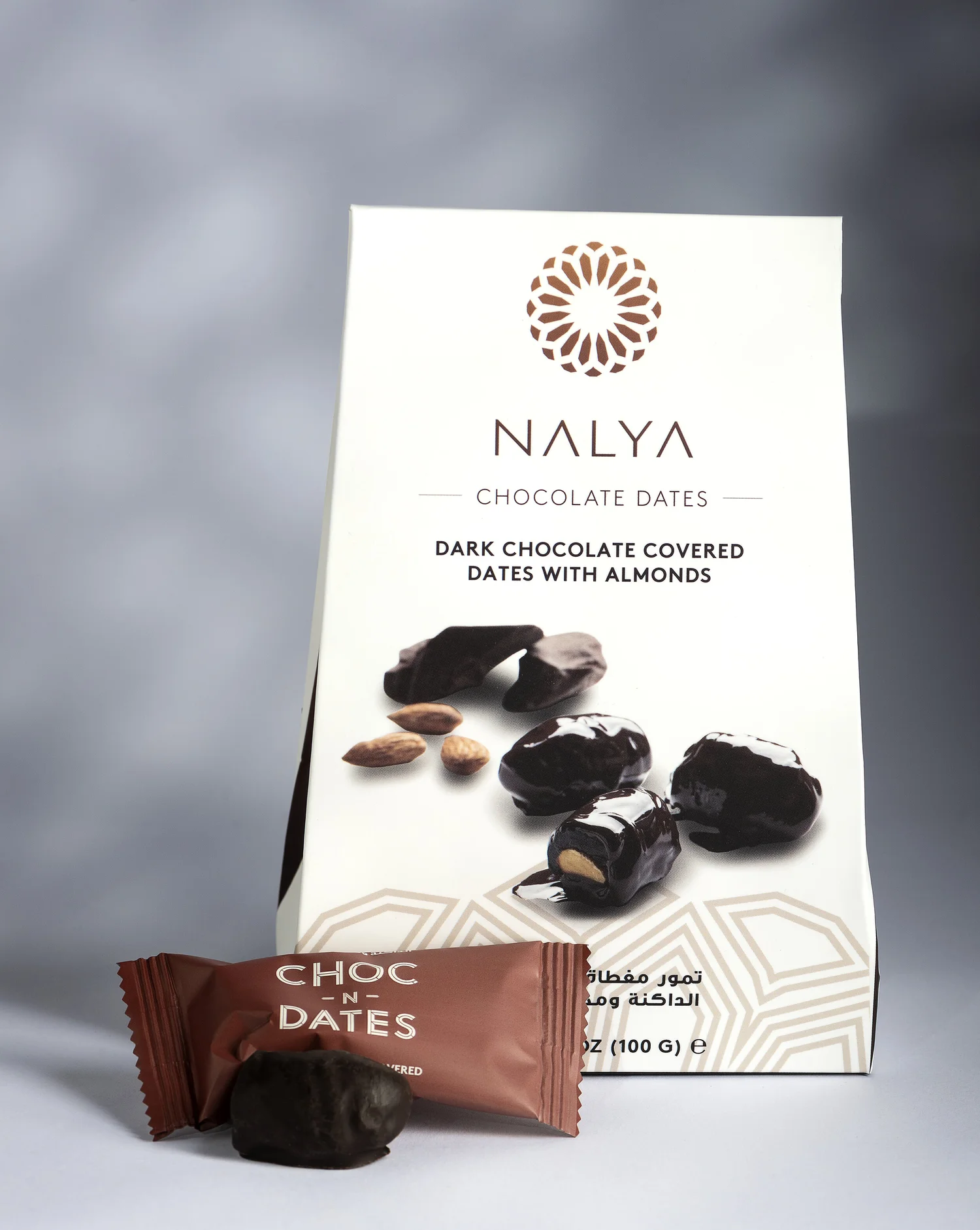 Dark chocolate covered dates with almonds — Nakheel Alya
