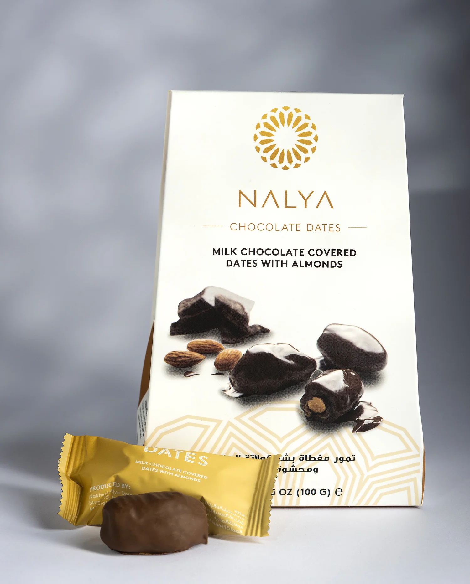 Milk chocolate covered dates with almonds — Nakheel Alya