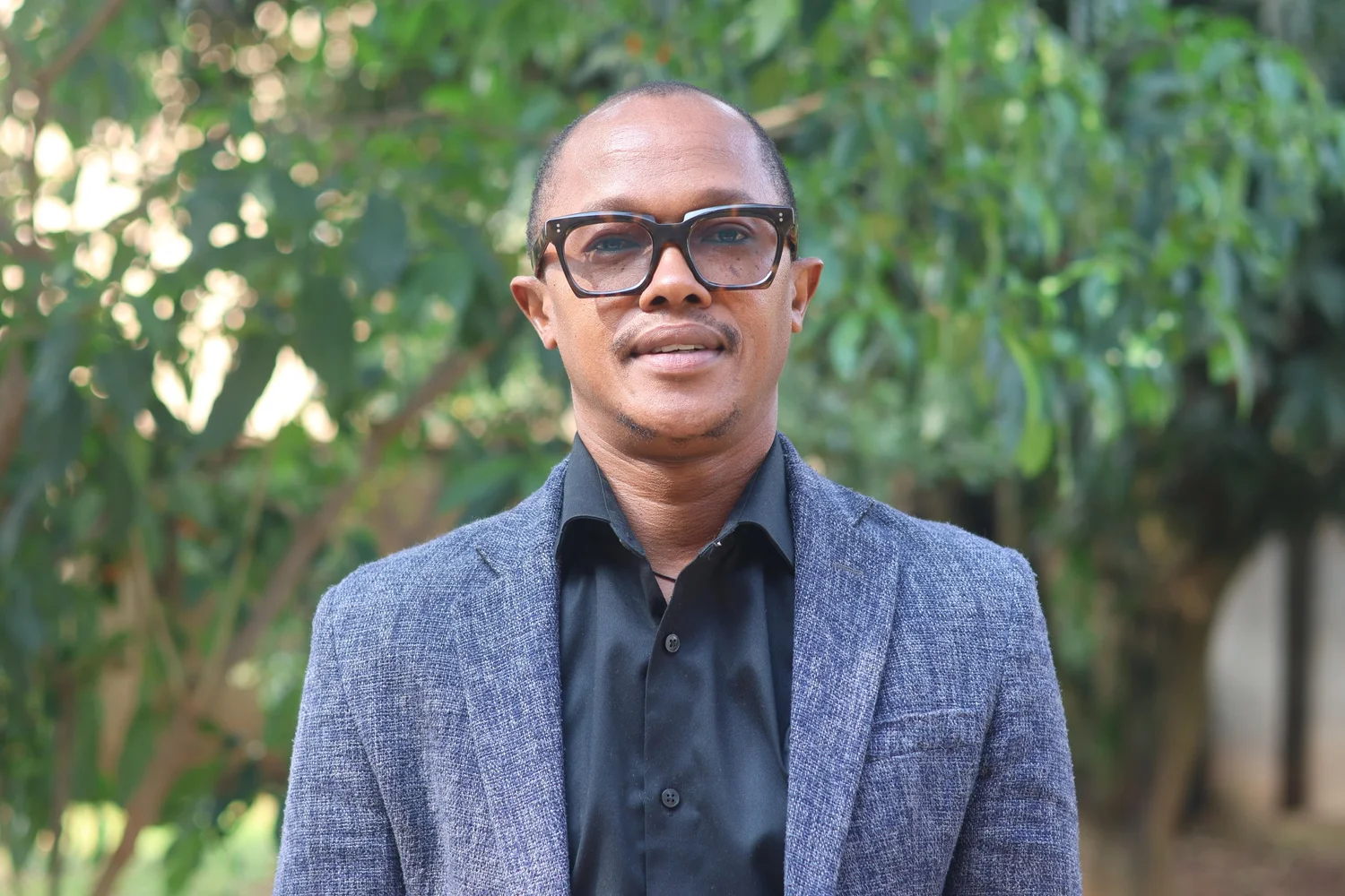 Our Team — Wezesha Impact