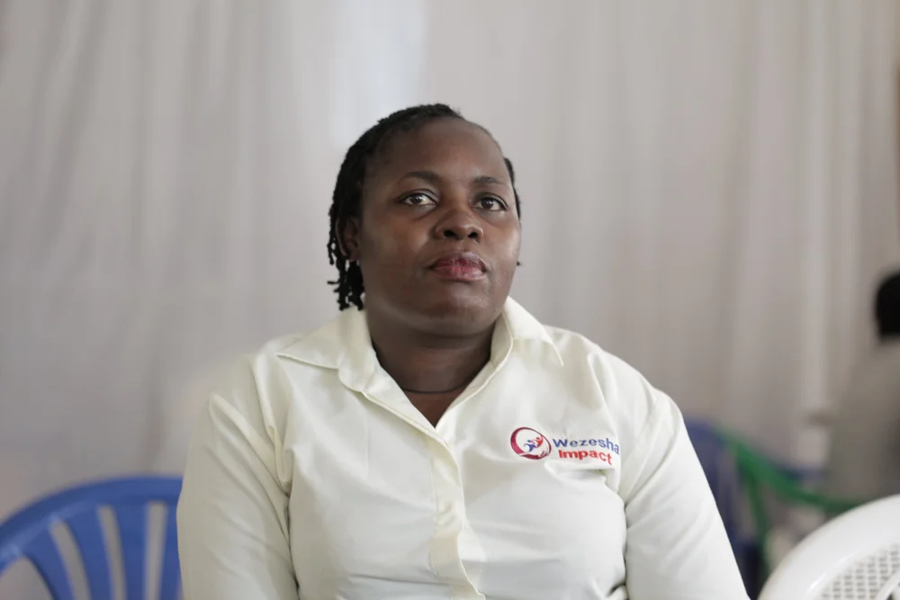 Our Team — Wezesha Impact