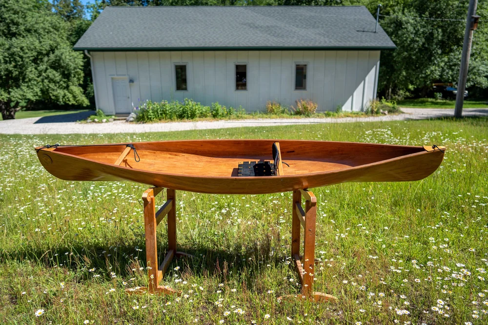 Lightweight, durable, hand-planked wooden canoes designed to paddle ...
