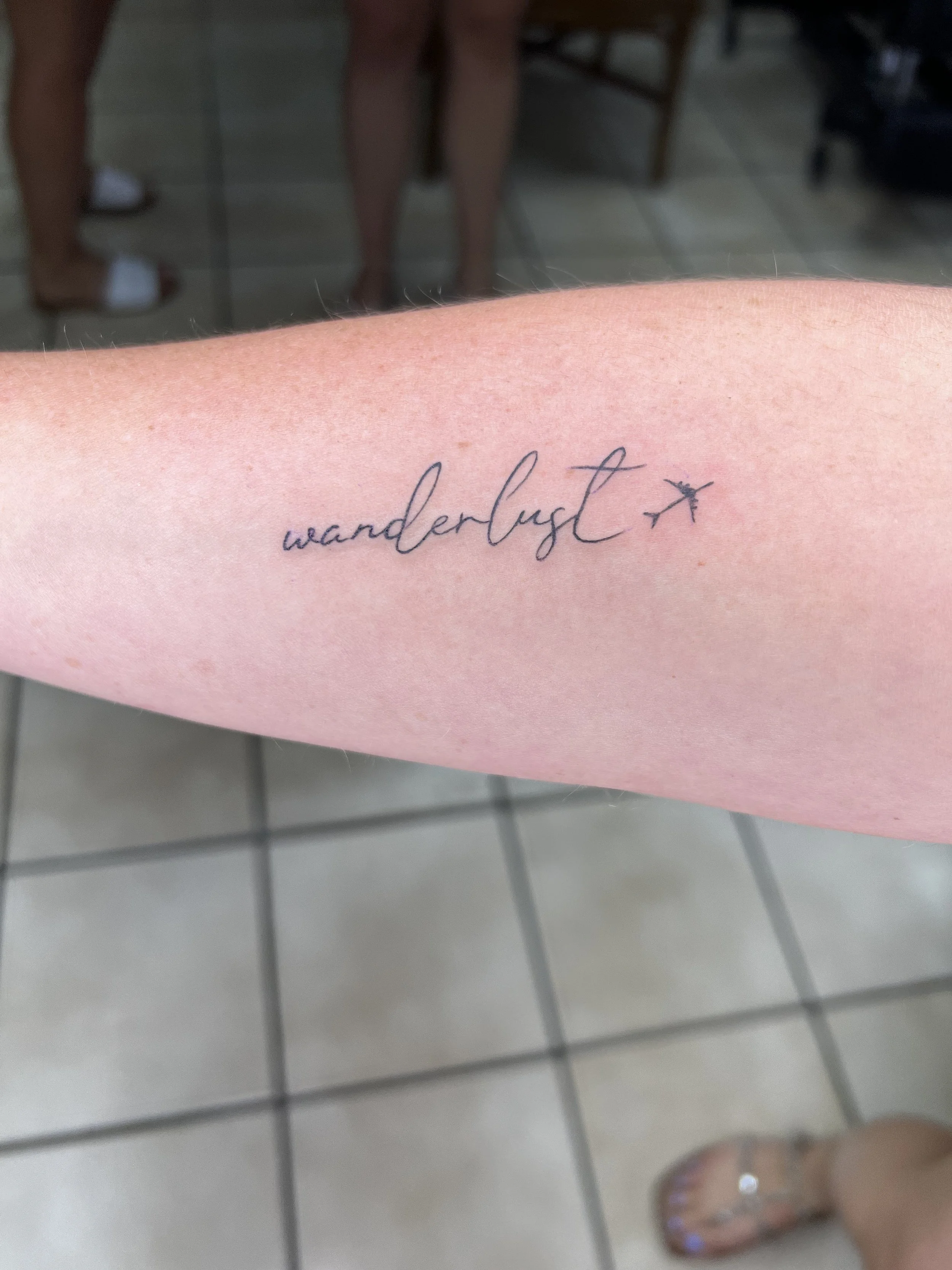 Wanderlust Foot Tattoo