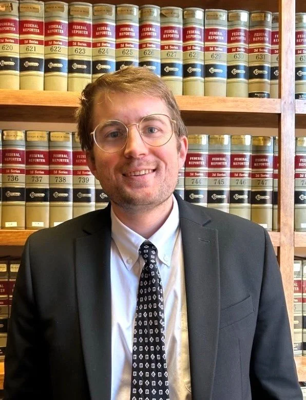 John W. Evans — McCloskey, Mina, Cunniff & Frawley