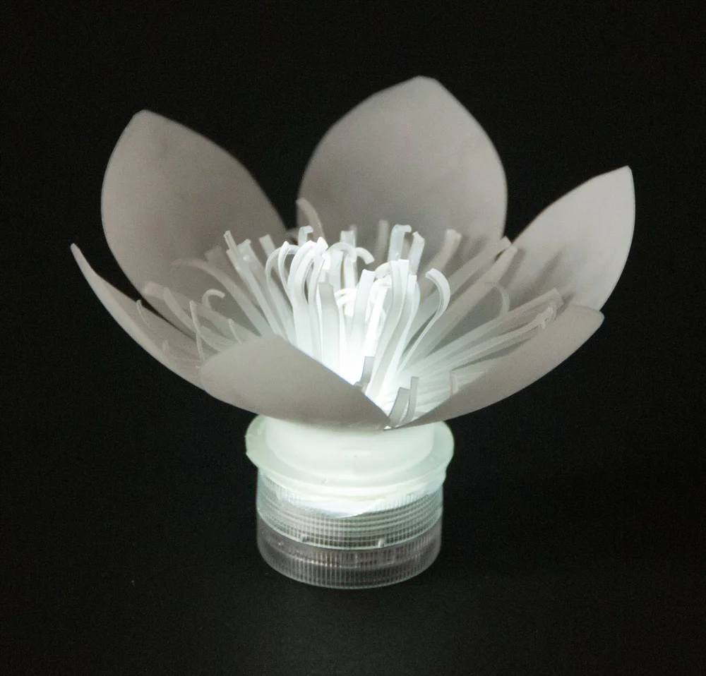 LED upcycled plastic bottle flower — Sarah Turner Eco Art & Design