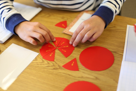 Materials Highlight: The Fraction Insets — White Bear Montessori School