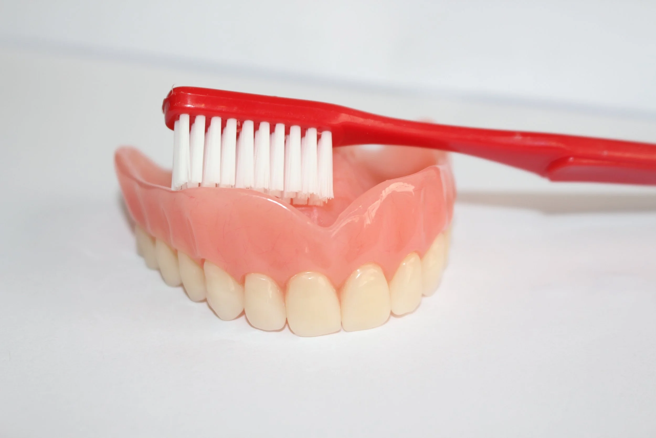 How to clean your dentures — Clinical Smiles Denture Clinic