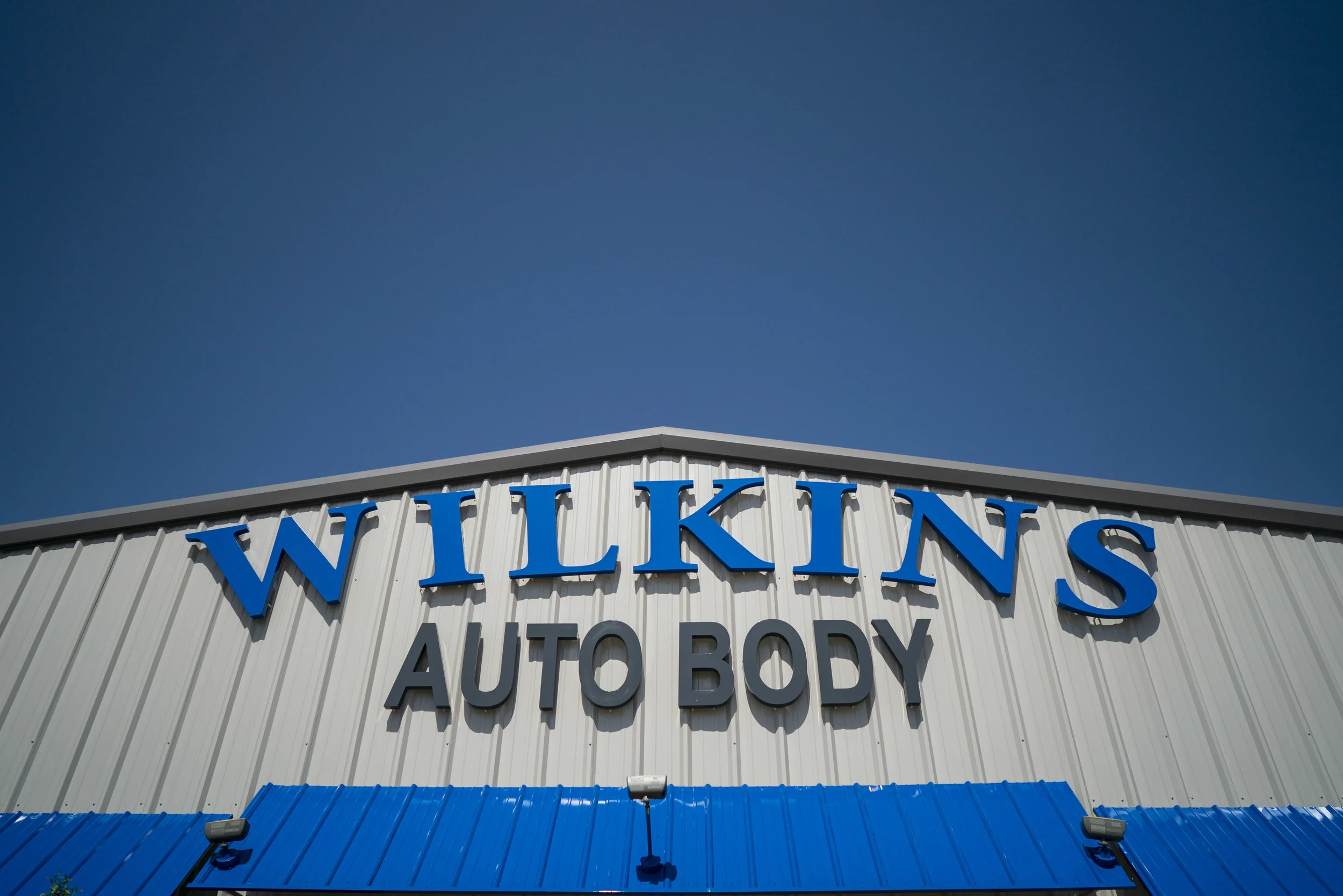 OUR STORY — Wilkins Auto Body