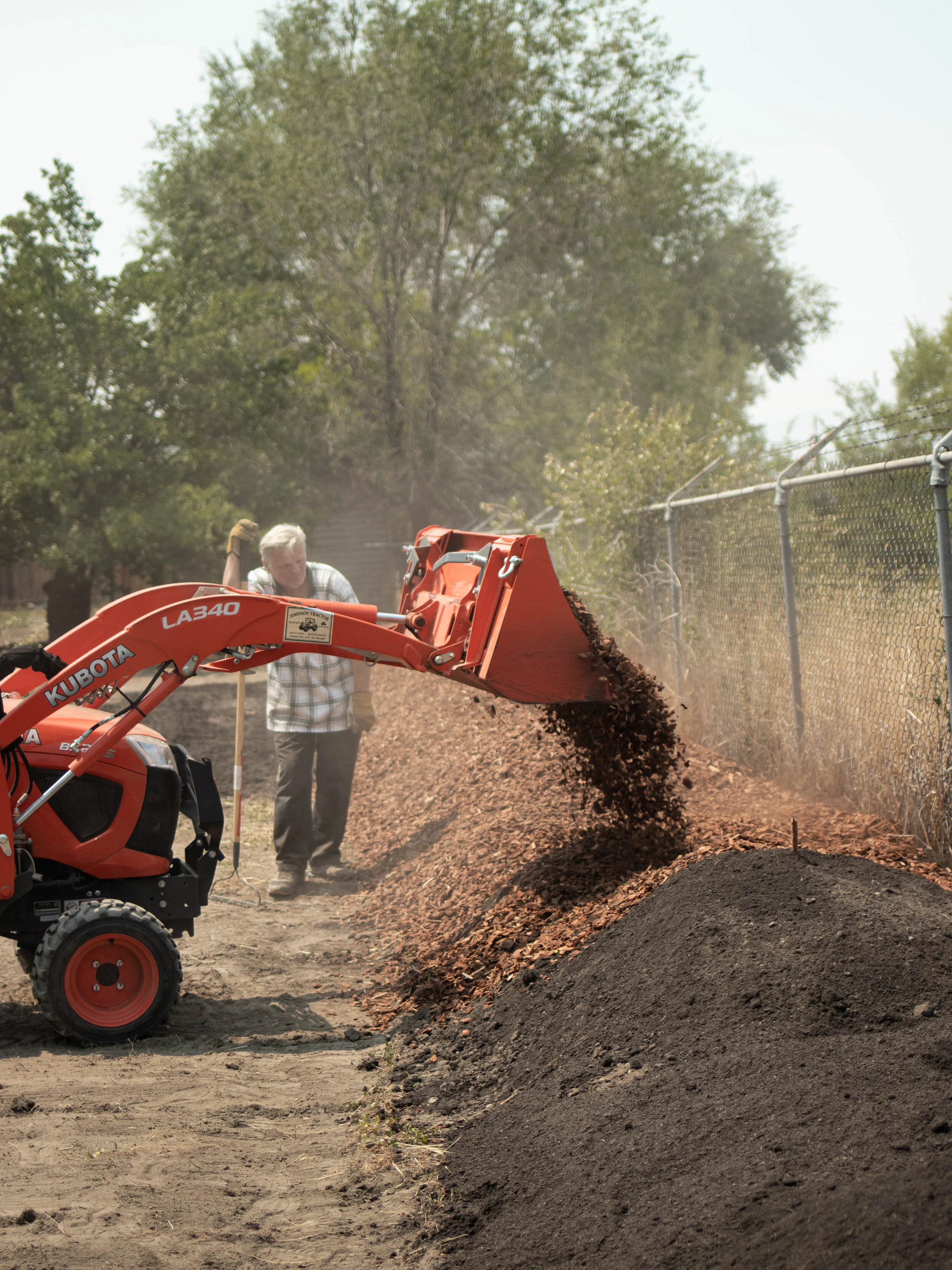 How & Why We built a Hügelkultur Privacy Berm in our Backyard - GATHER ...