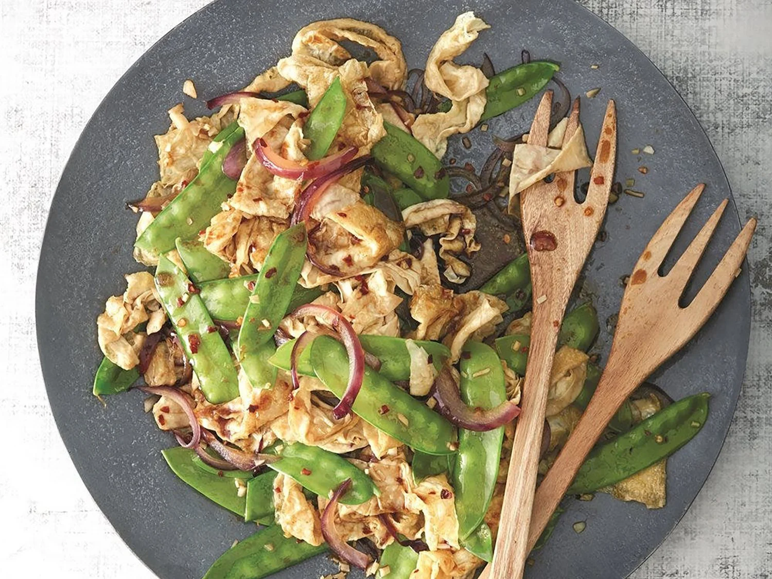 Stir Fried Snow Peas and Tofu Skins — The Tofu Everyone Raves About