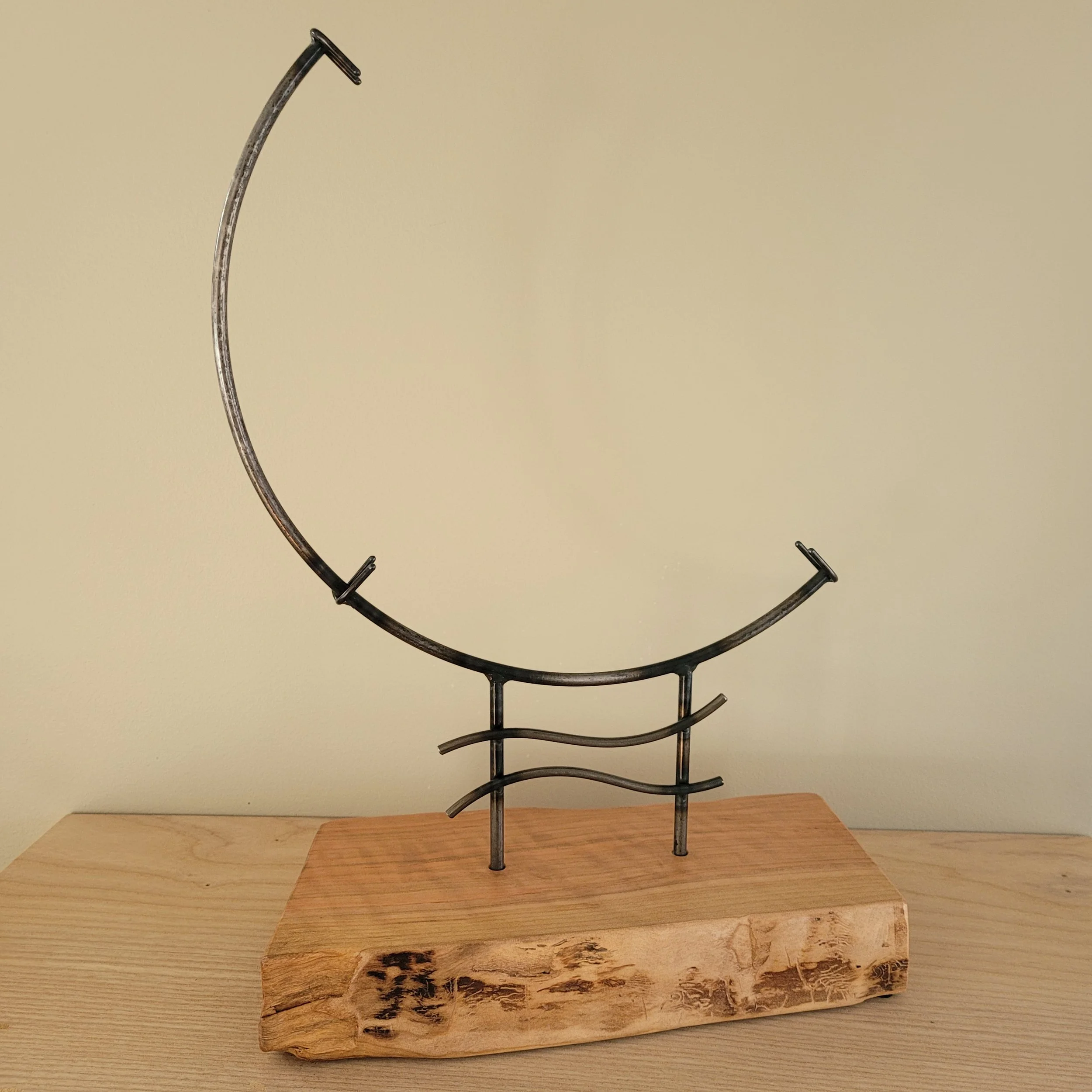 12" round glass stand on maple — dave hardell