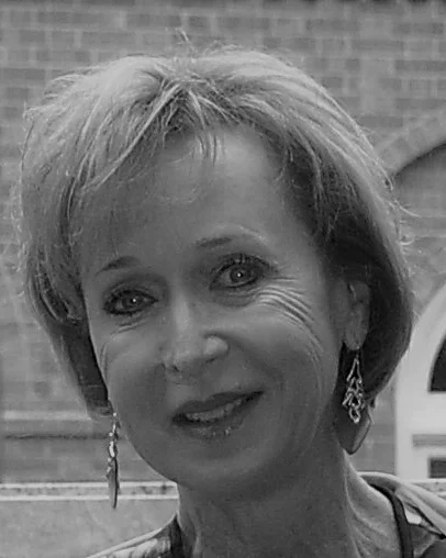 Our Team — EVANS & MOSSMAN