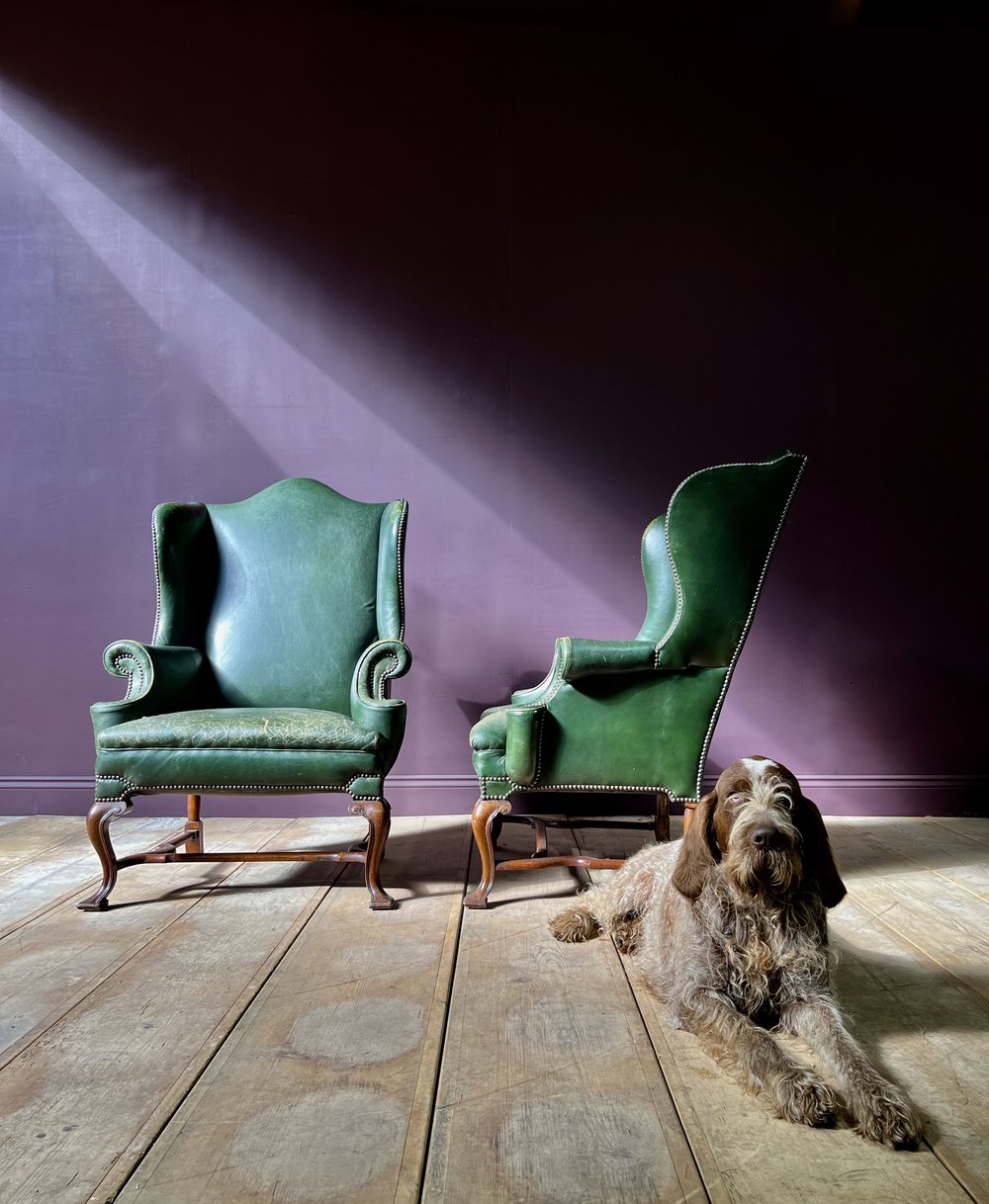 Fine pair of English leather wingback chairs Stag Squire