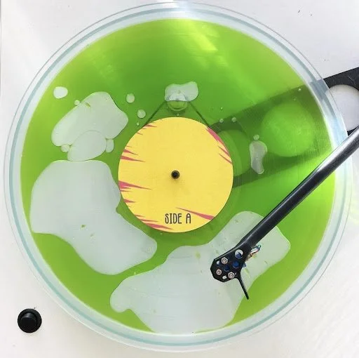 Hologram, Liquid Filled, & X-ray Records, Oh My! — afterglow