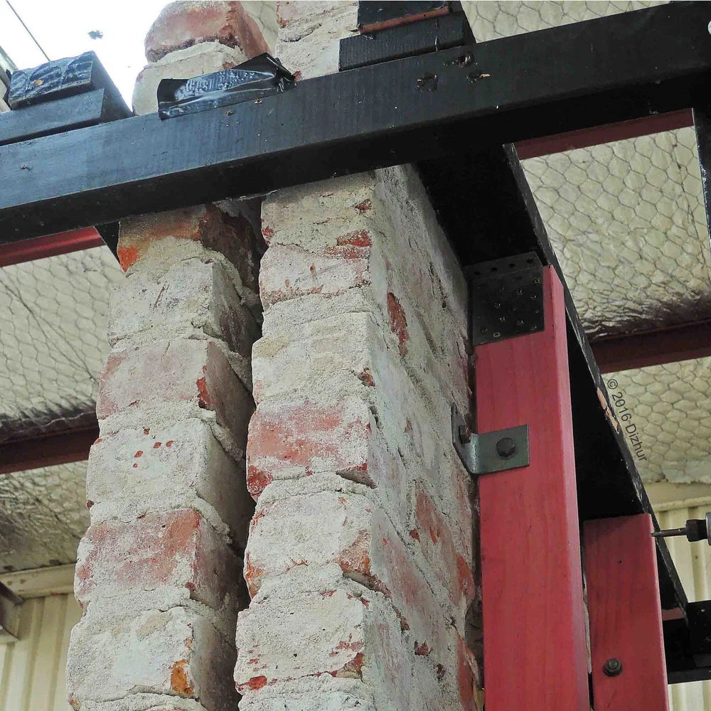 Seismic retrofit of masonry walls using timber strong-backs — PYTHON ...
