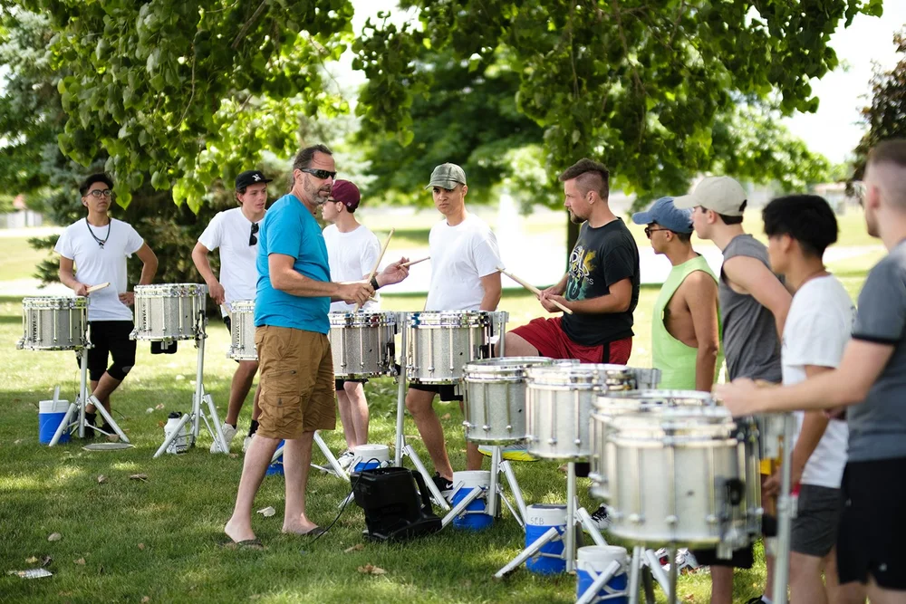 Tom Rarick Promoted to Director of Percussion, Carter & Team Return ...