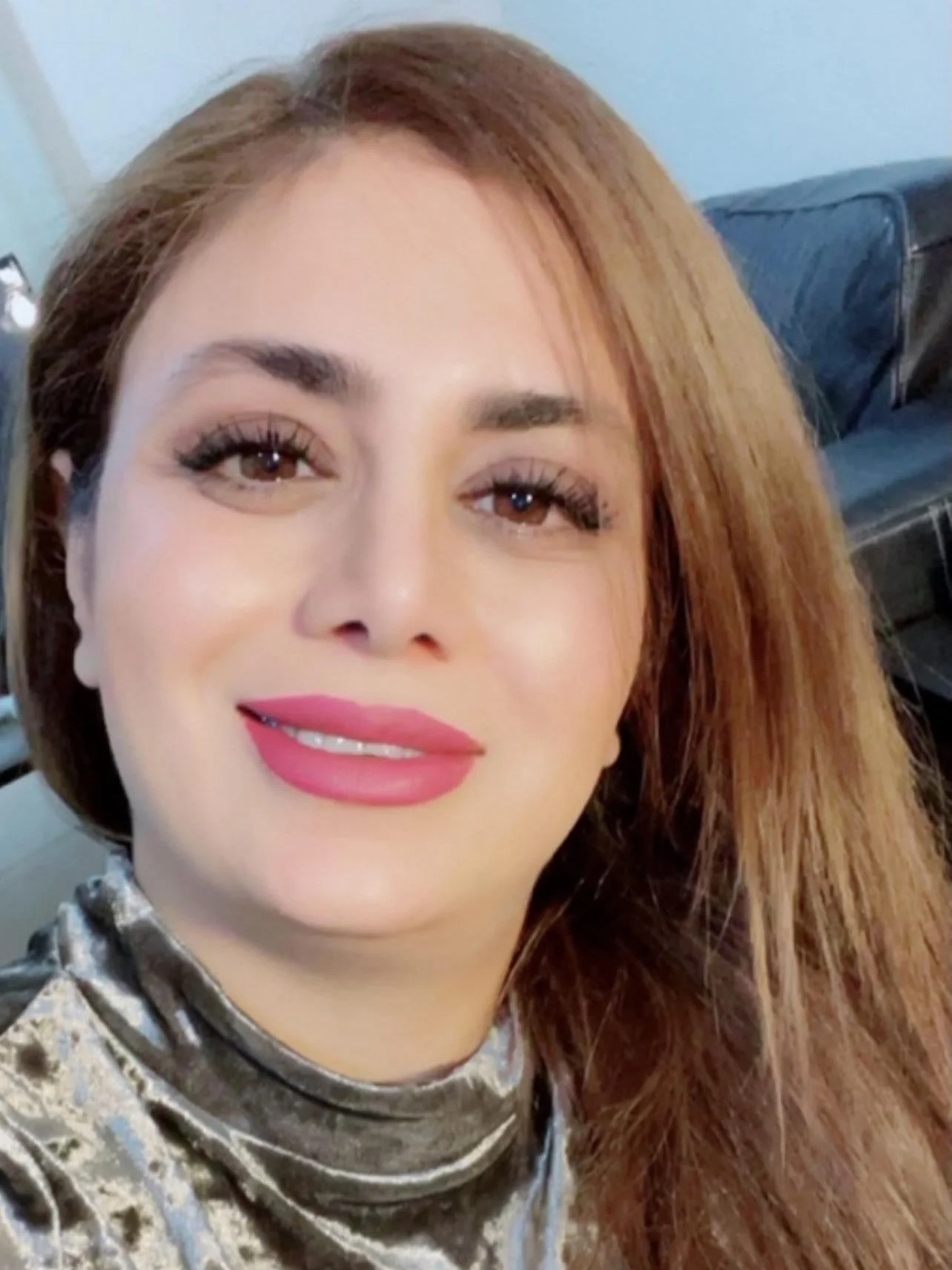 Neda Adhami - Bio — Center for Empowering Refugees & Immigrants