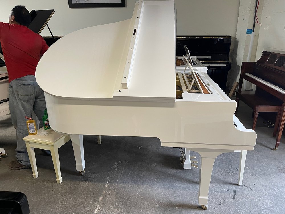 White Grand Piano