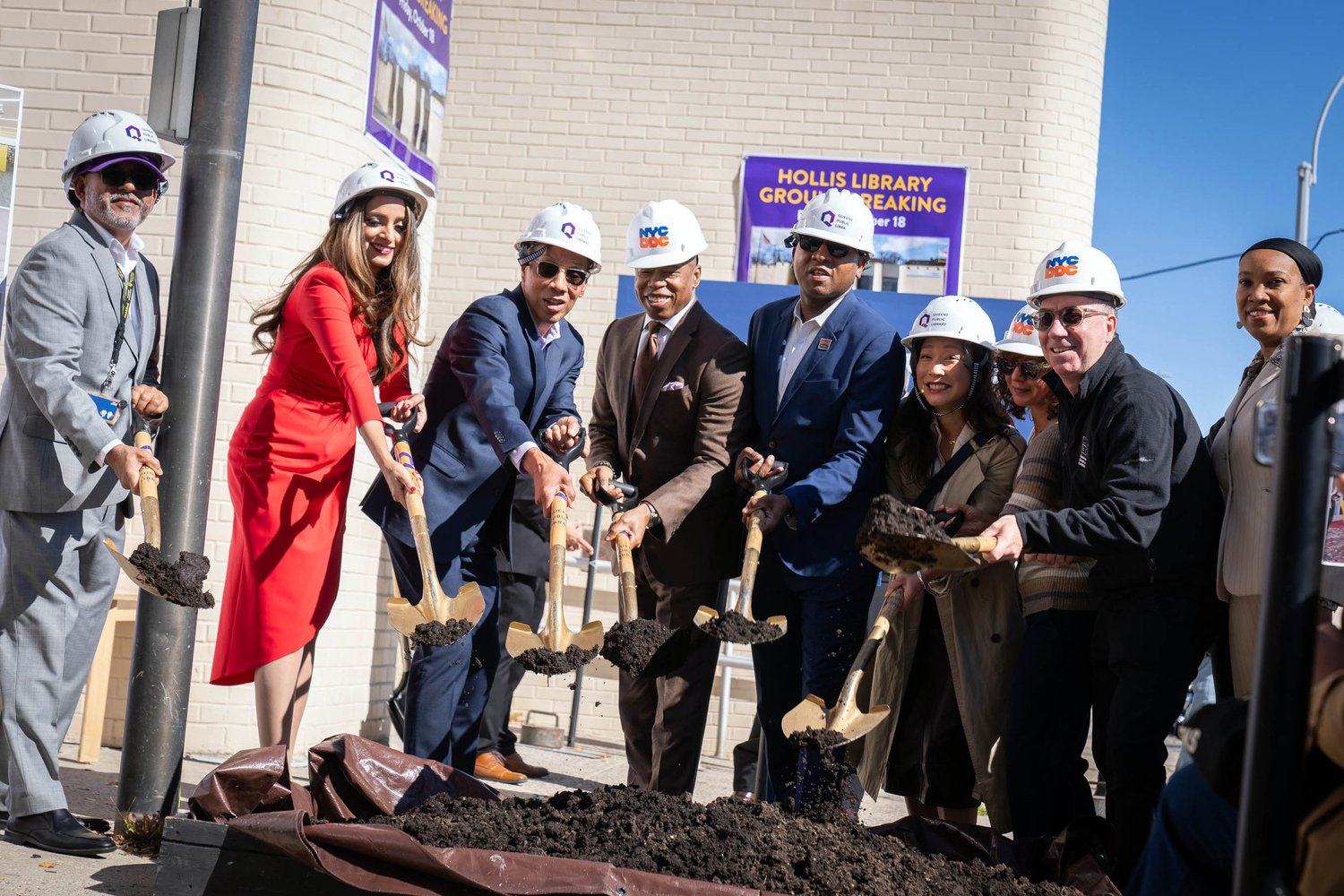 After library budget fight, city breaks ground on Hollis branch ...