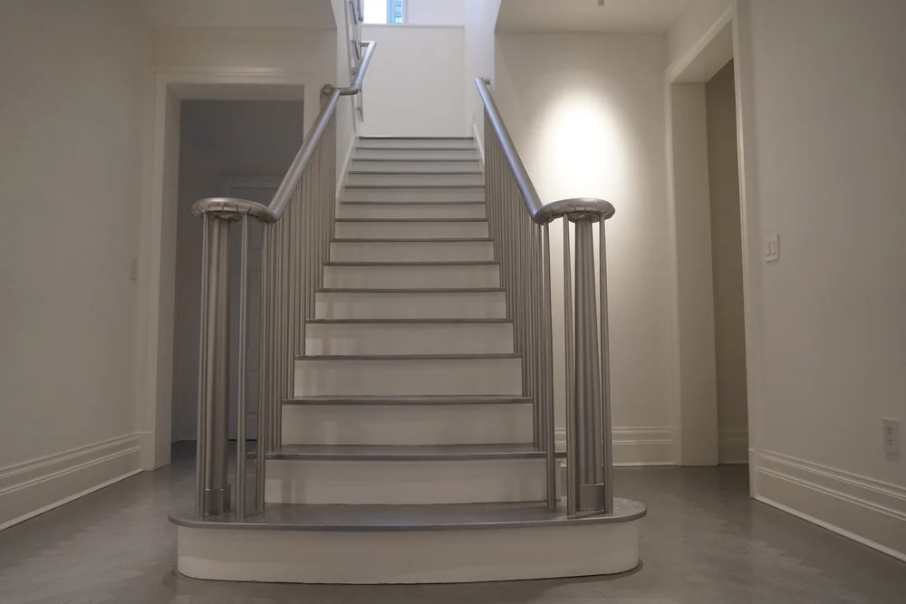 leather wrapped handrails — Architectural Leather Works