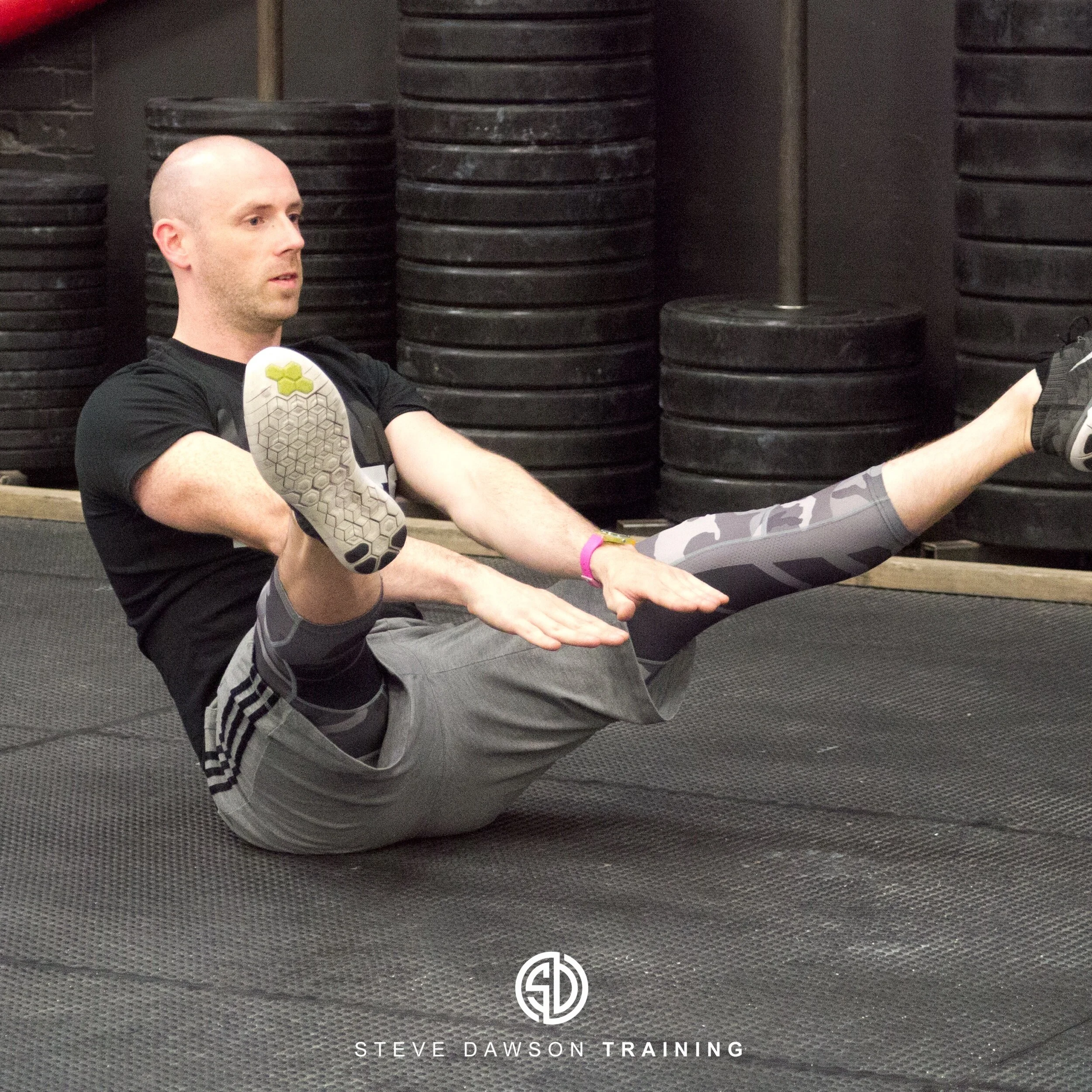 Straddle V Ups Yoga Poses To Ease Runner's Back Pain