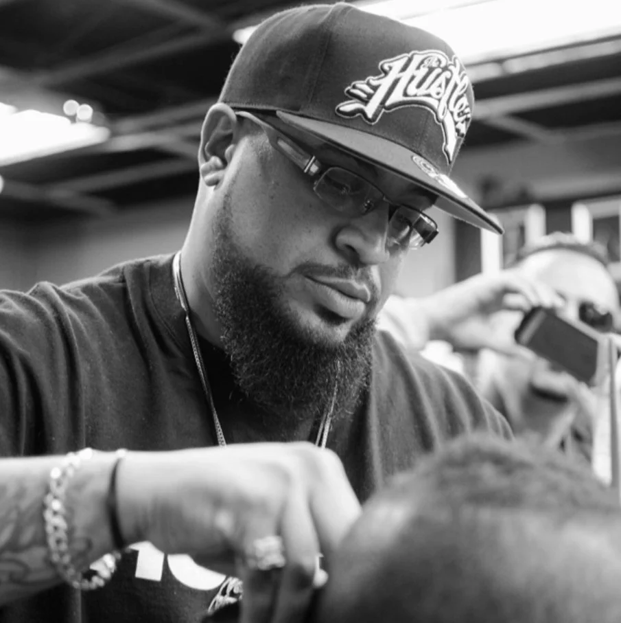 The Hustle Barbershop Queens