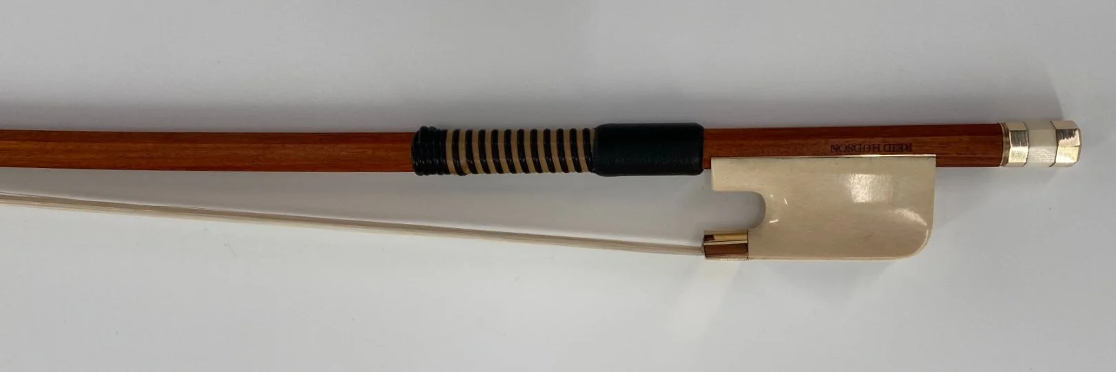 RKT-2612 Reid Hudson Gold Mounted Cello Bow