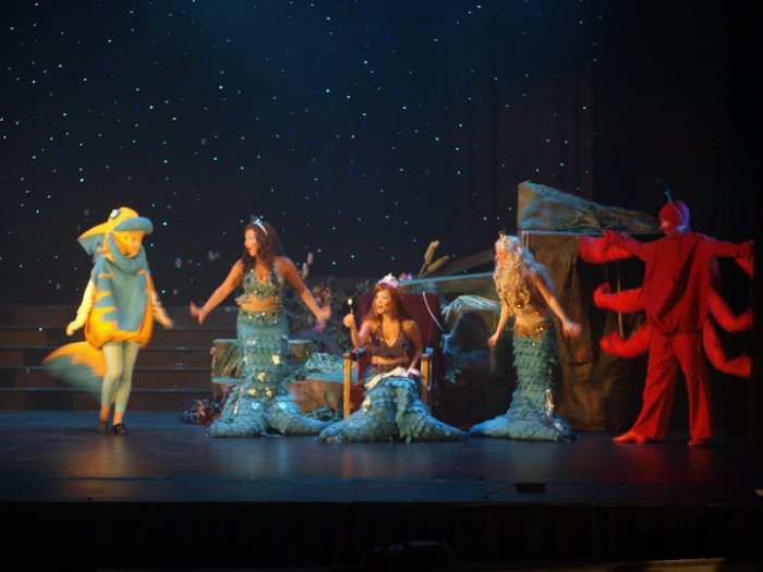 About the Director — PORT PLAYERS