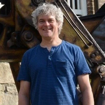 A restoration of the original water wheel for Manor Mill. — Manor Mill