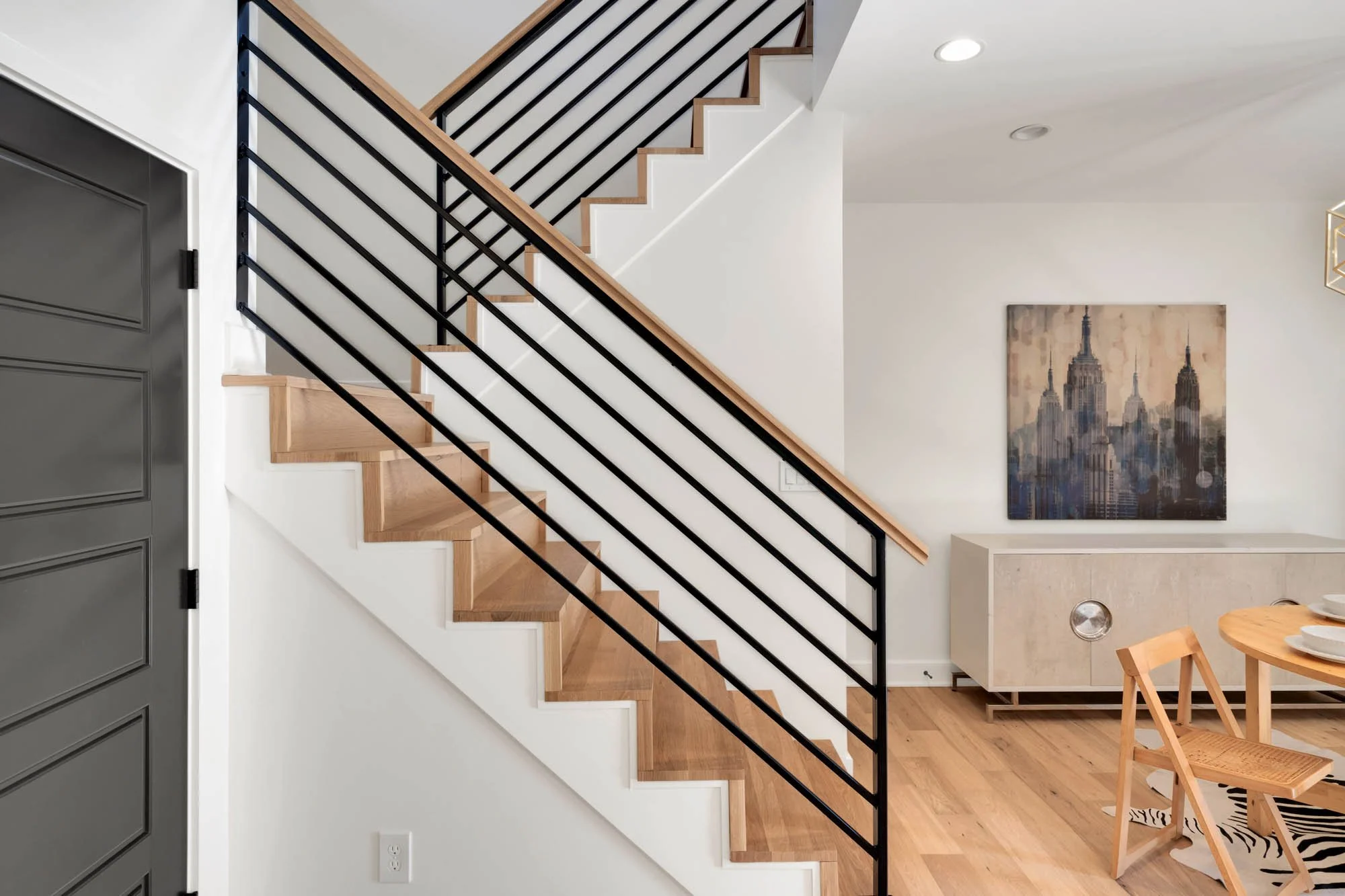 Contemporary home in Louisville Rivers Edge community features black ...