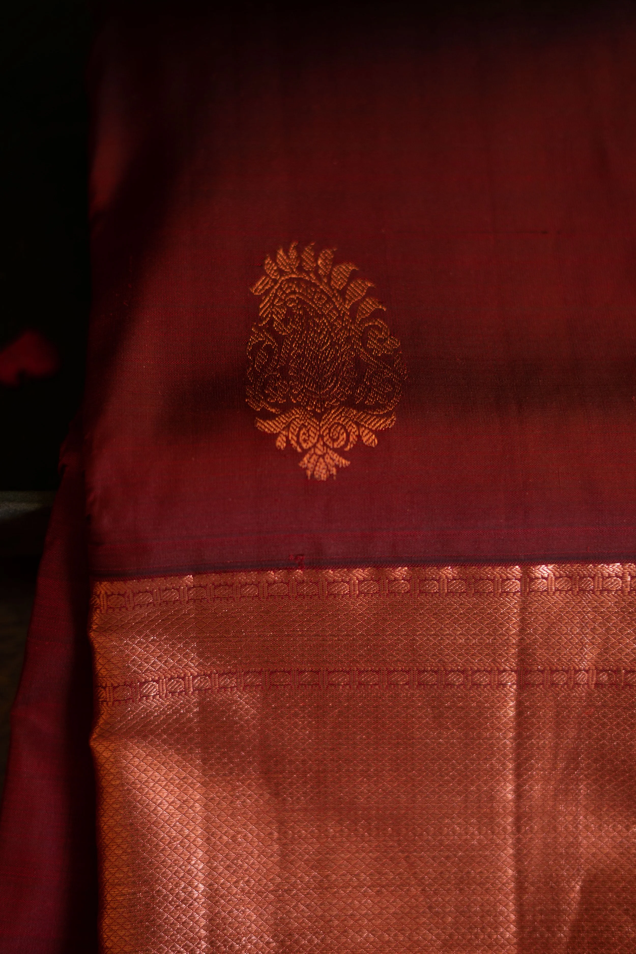 Dark Red Kanchipuram Silk Saree with Peacock Long Border
