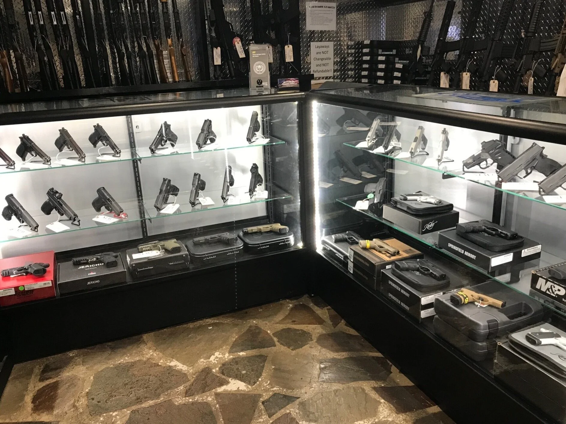 3 Ways To Merchandise Handguns — Quality Wood and Metal Designs