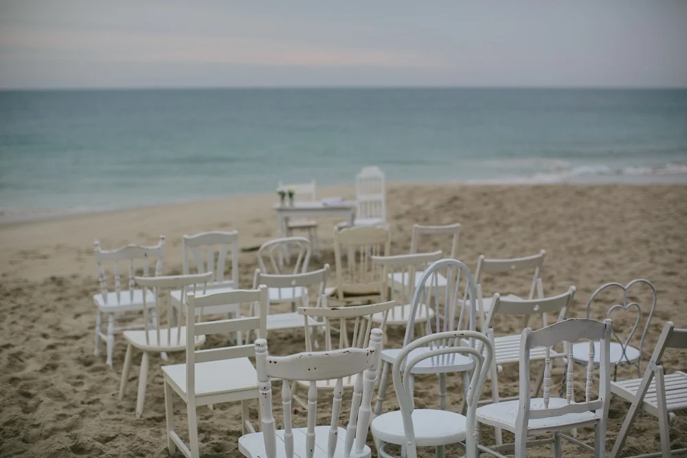 Mismatched White Wooden Chairs — Pretty Willow Prop Hire Perth
