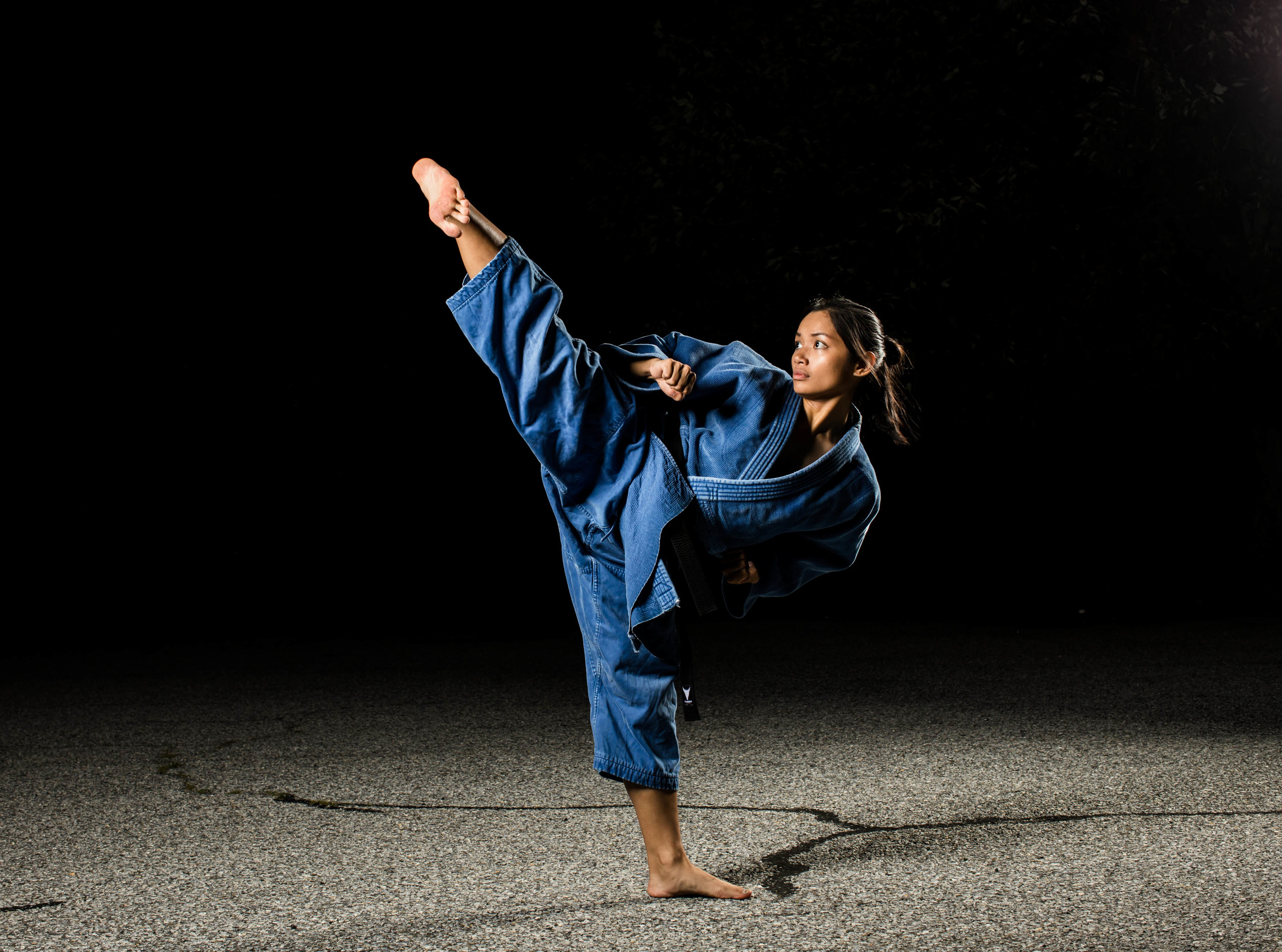 Female Martial Artists Flying Kick