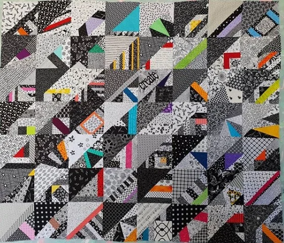 20+ Quilt Ideas Using (half square) Scrappy Triangles | Leila Gardunia ...