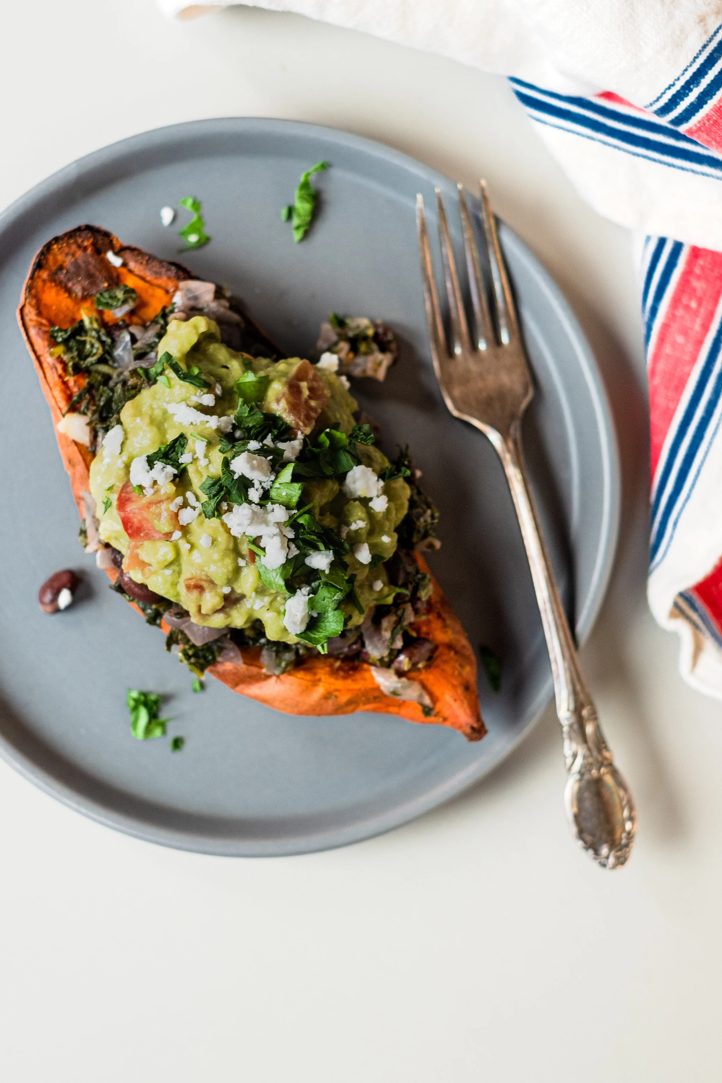 Stuffed sweet potatoes with beans and guacamole — Suzanne McCarthy ...