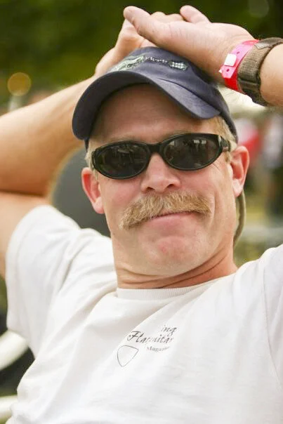 About — John Lowell