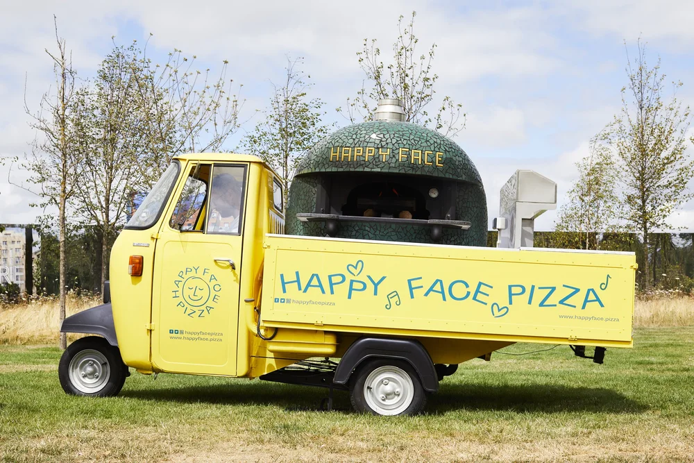 Pizza on wheels with the return of the Happy Face Pizza Truck — Warm ...