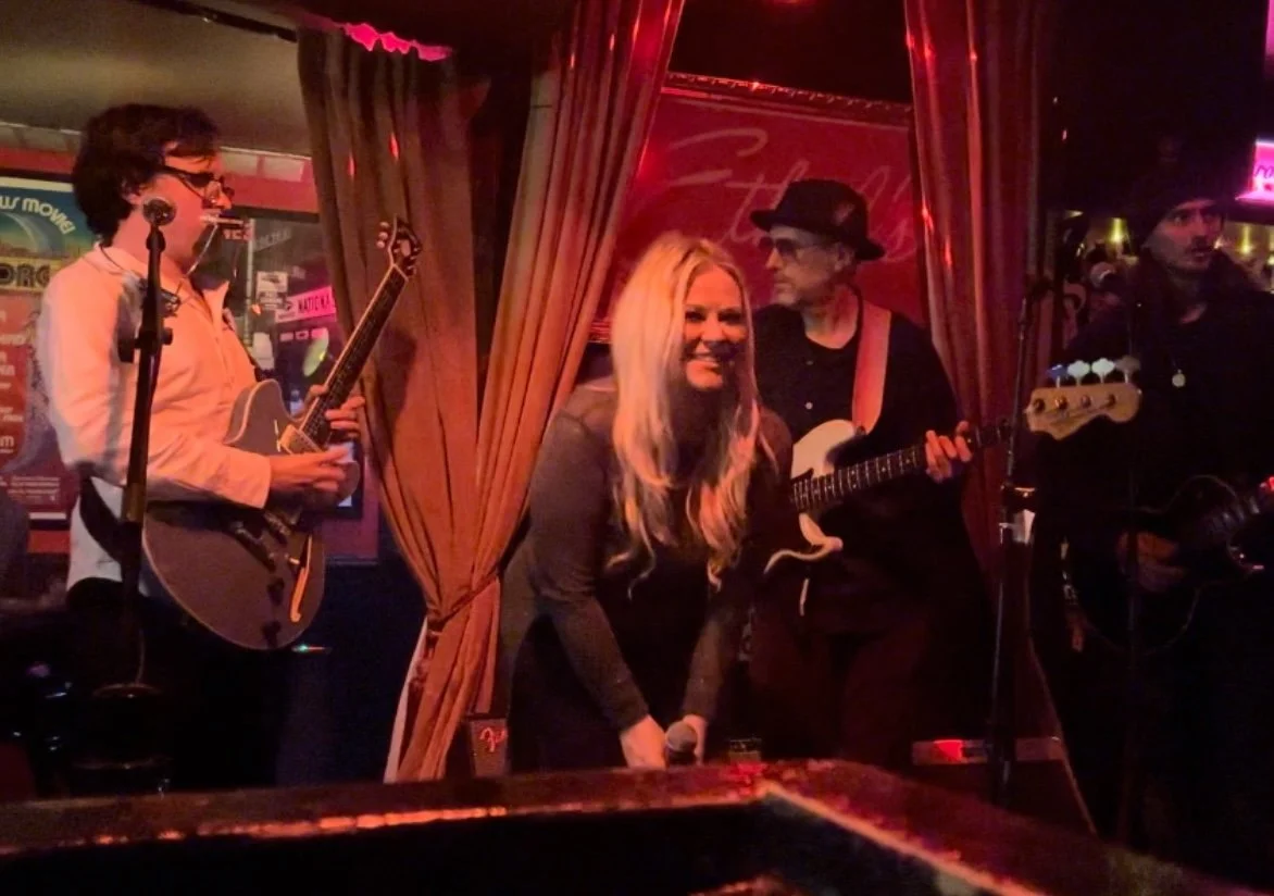 Woman — KELLI BAKER