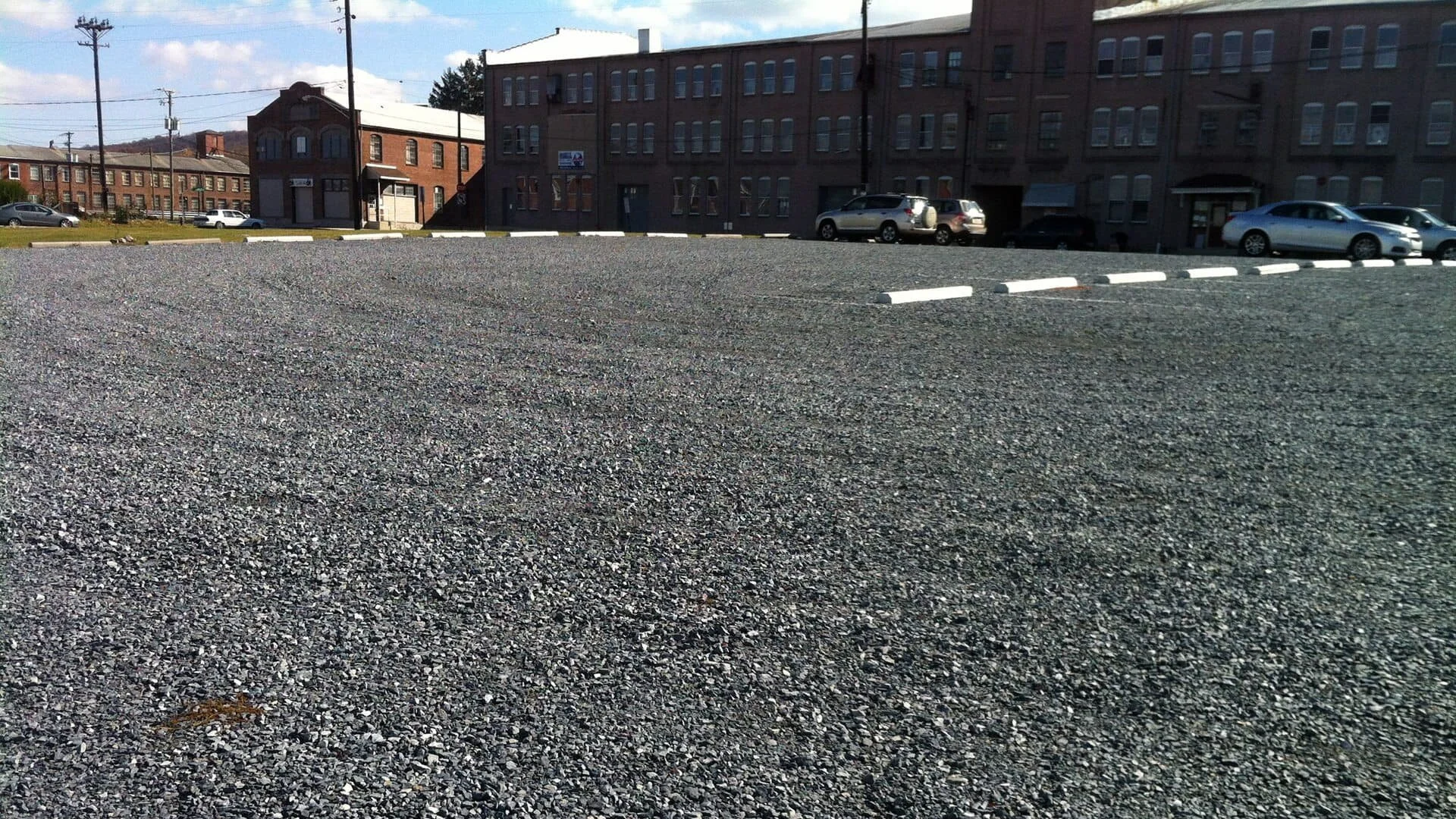 Gravel VS Concrete Parking Lots | CMC Soultions | Concrete Contractor