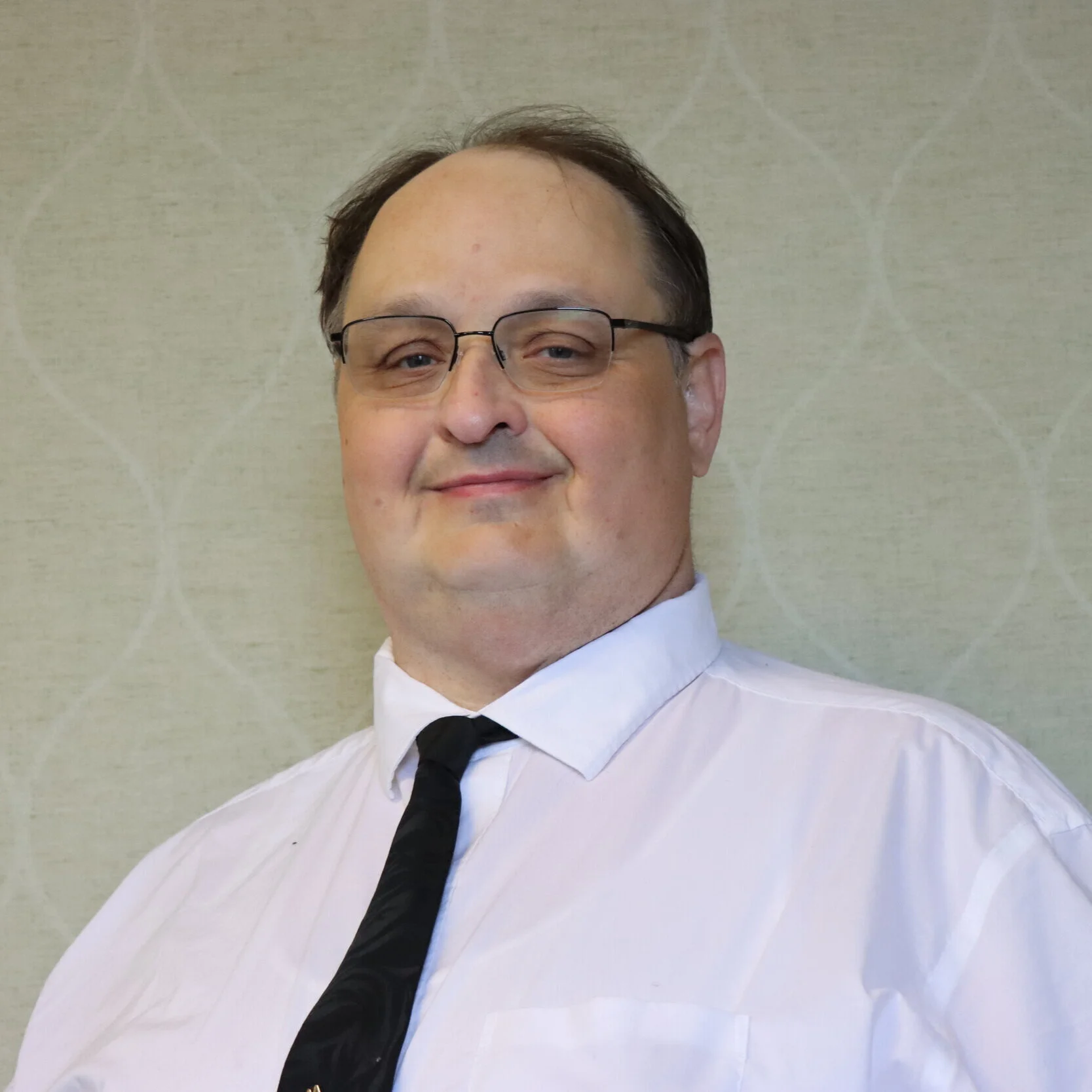 Our Team — Kalamazoo Defender