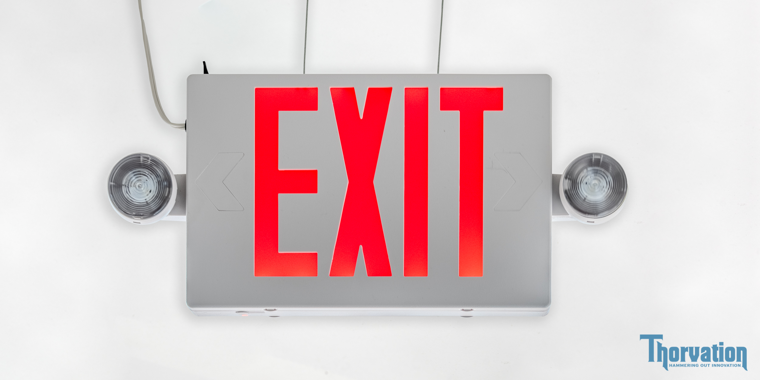 Thermoplastic Combination Exit Sign With Emergency Lights | Shelly Lighting