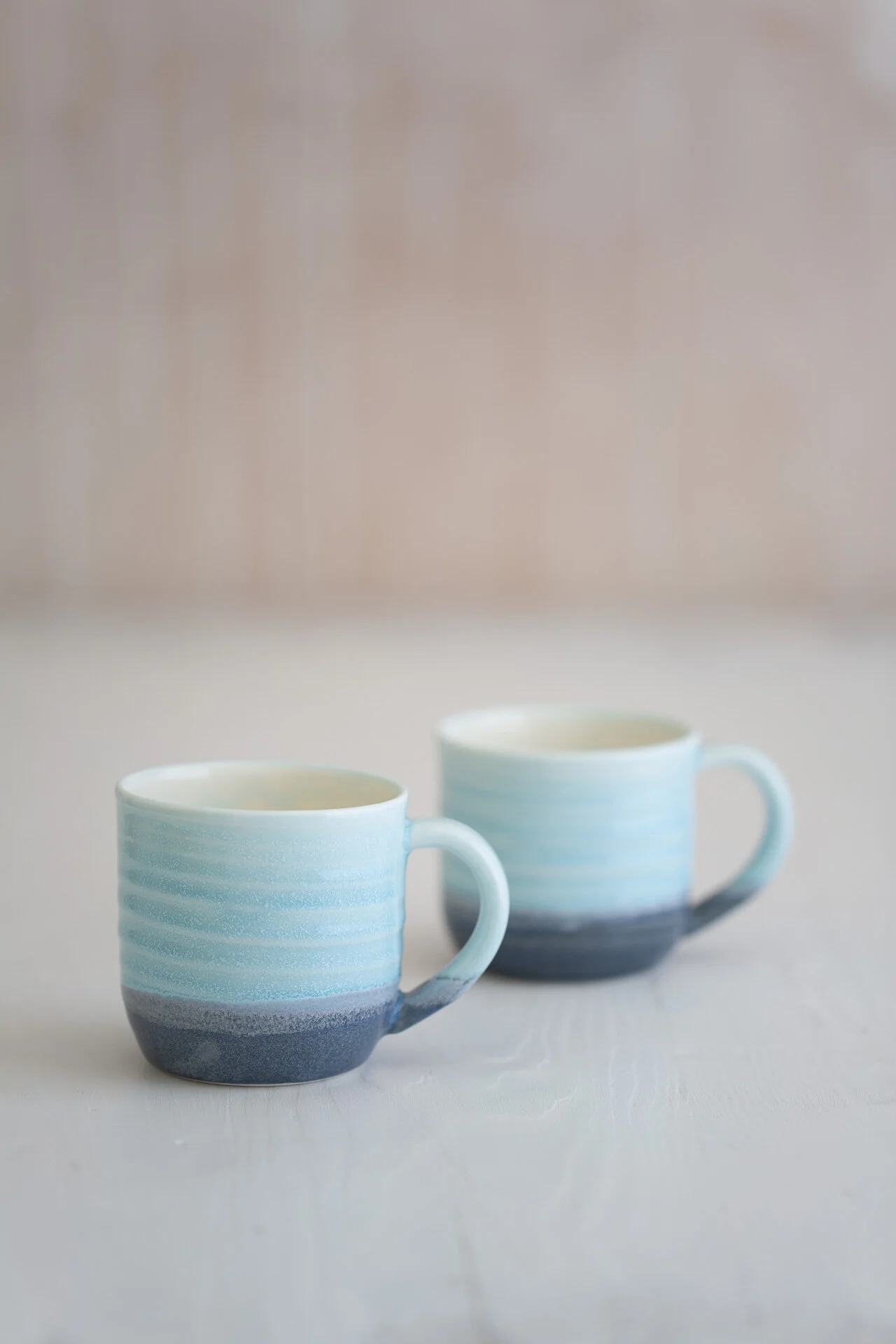 Beautiful hand-thrown ceramic vessels in porcelain clay with colours ...