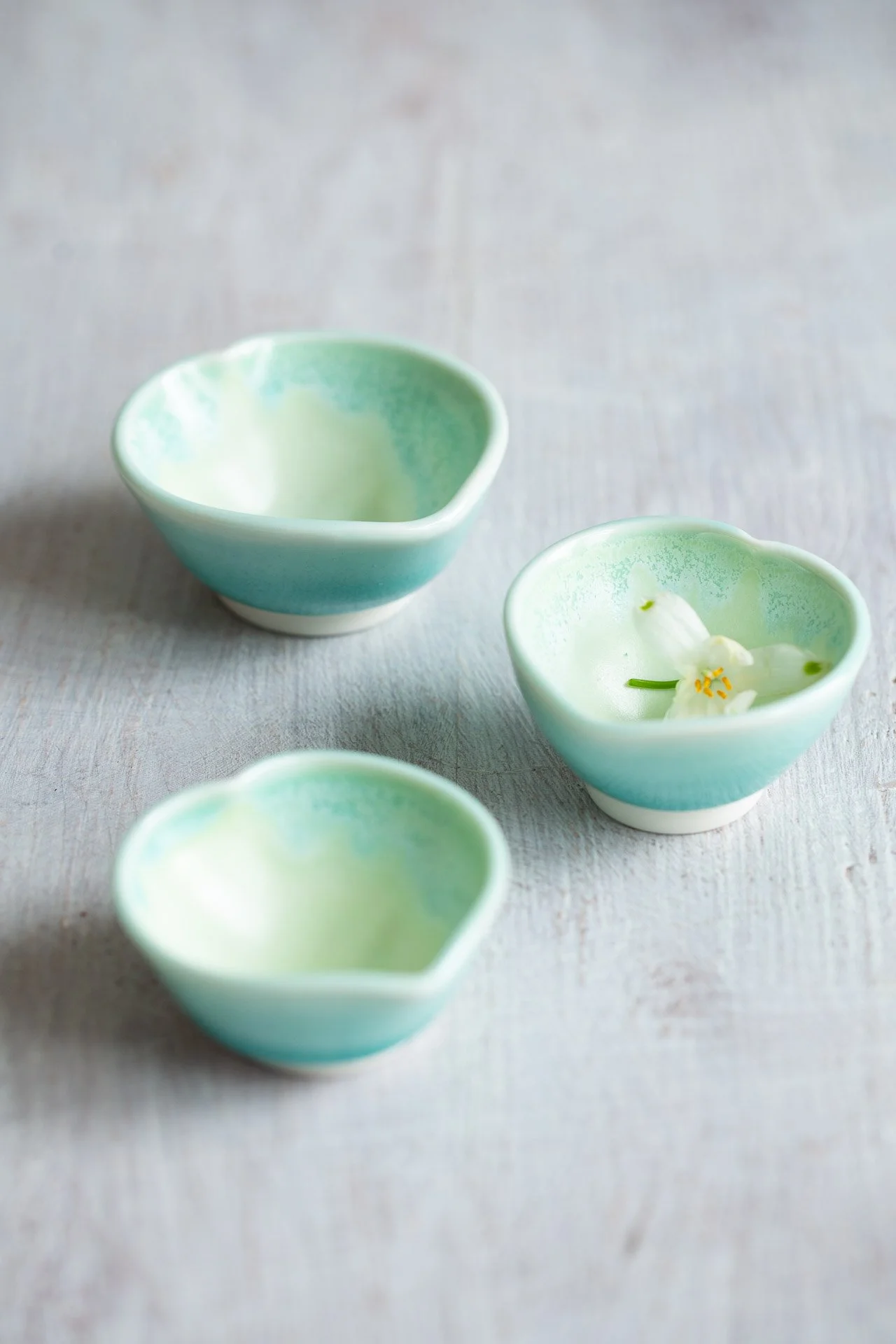 Beautiful hand-thrown ceramic vessels in porcelain clay with colours ...