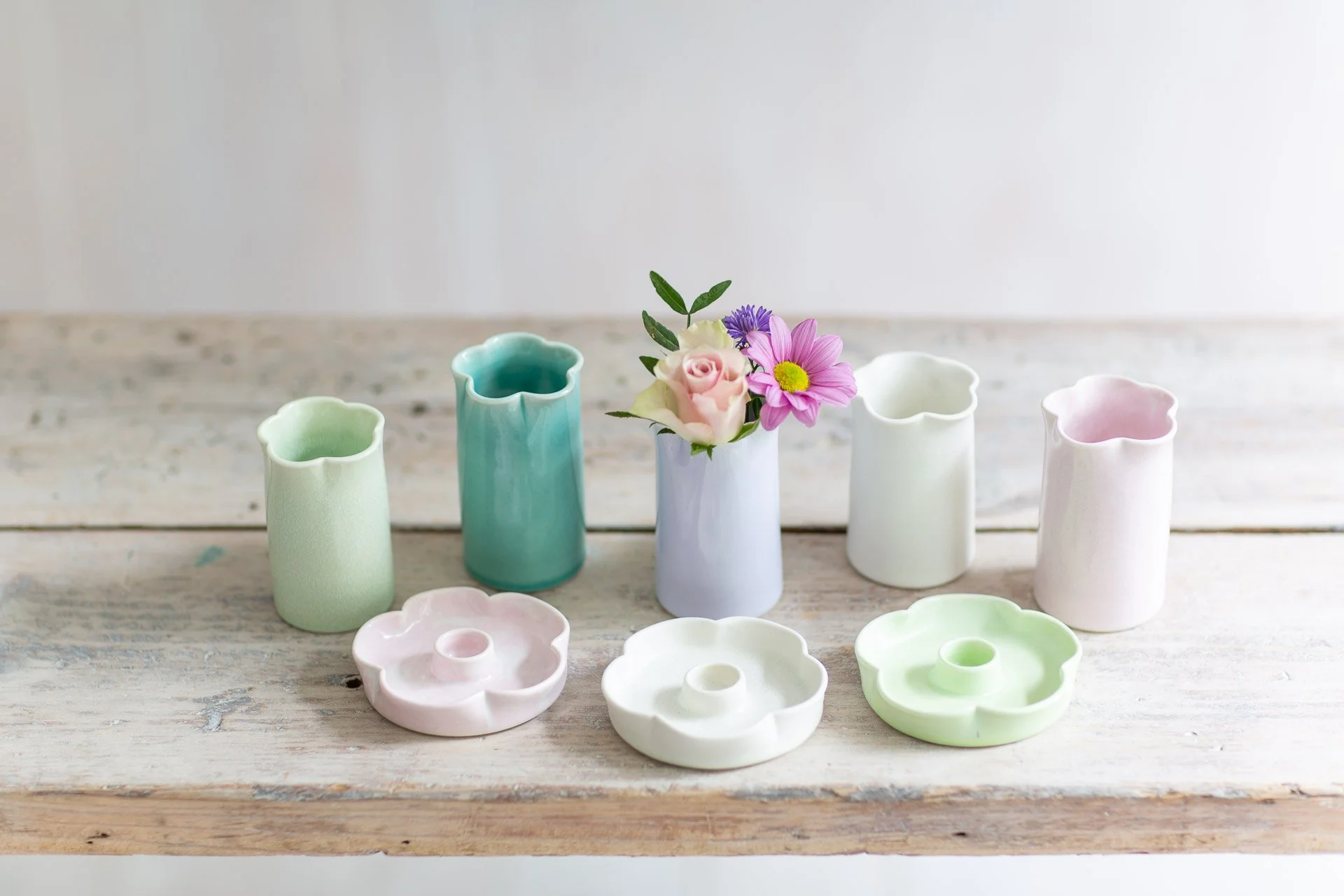 Beautiful hand-thrown ceramic vessels in porcelain clay with colours ...