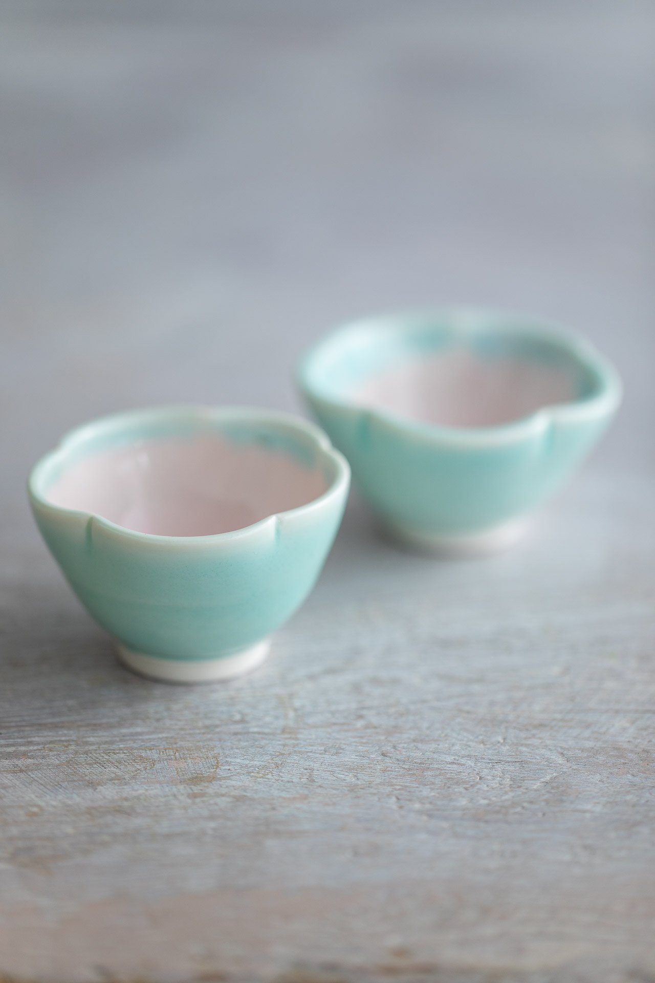 Beautiful hand-thrown ceramic vessels in porcelain clay with colours ...