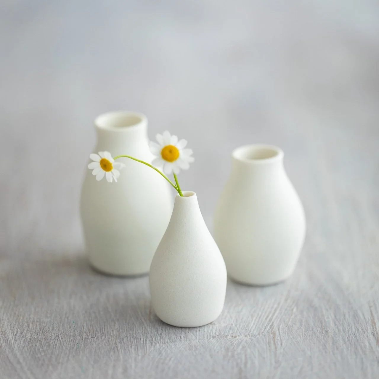 Beautiful hand-thrown ceramic vessels in porcelain clay with colours ...