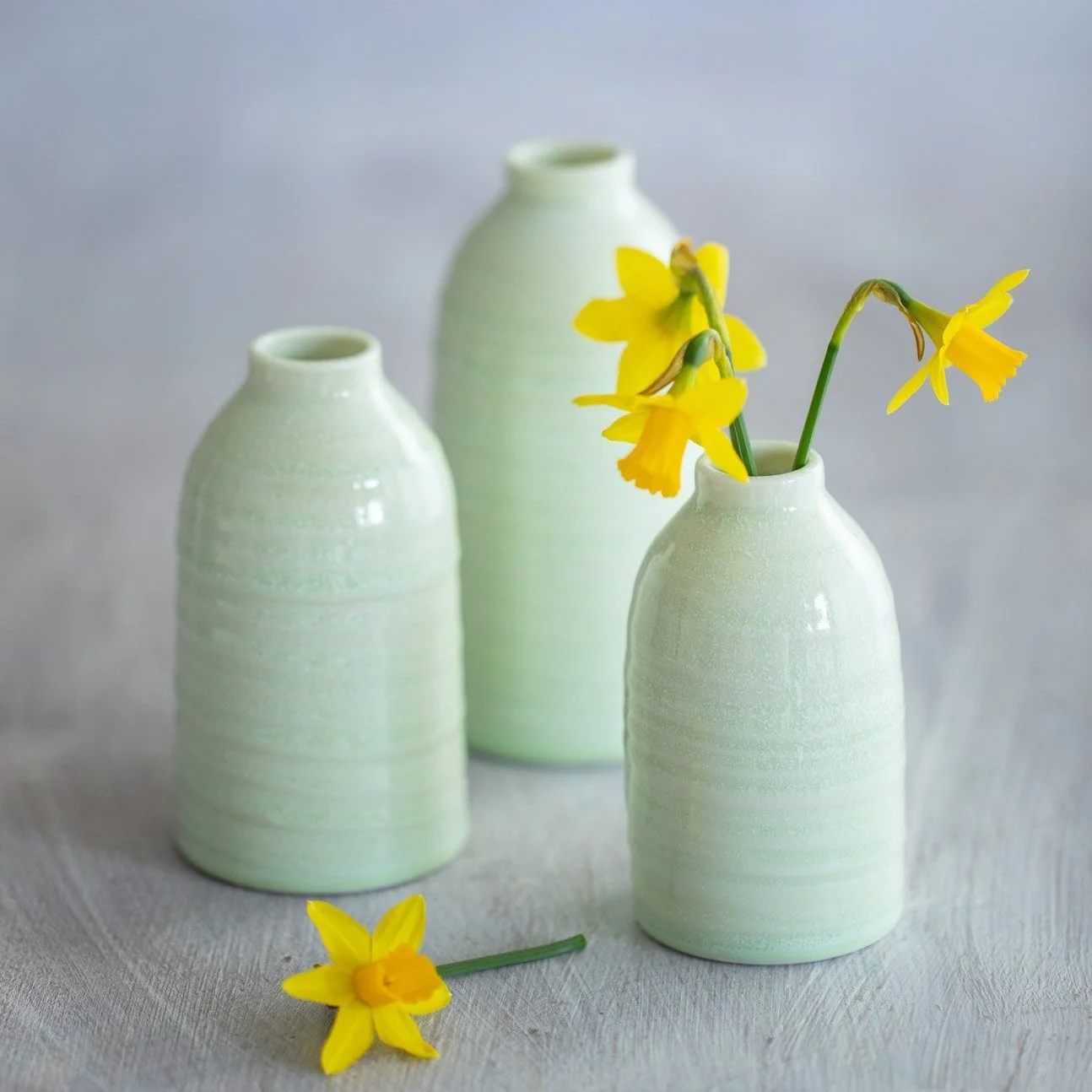 Beautiful hand-thrown ceramic vessels in porcelain clay with colours ...