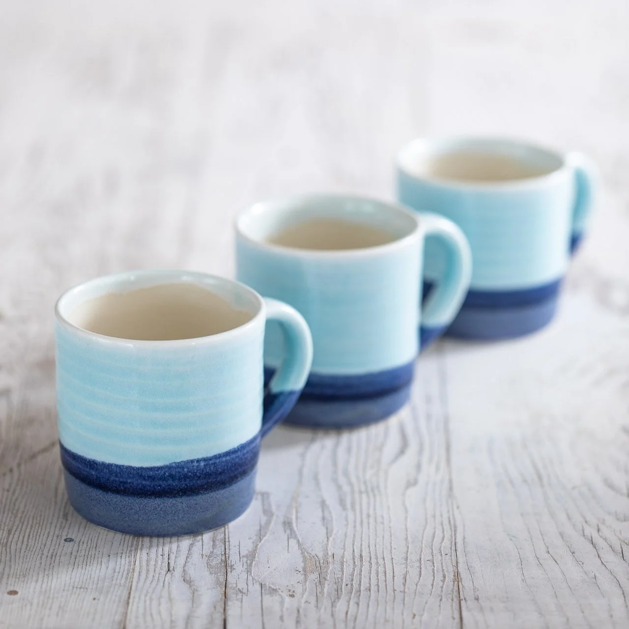 Beautiful hand-thrown ceramic vessels in porcelain clay with colours ...