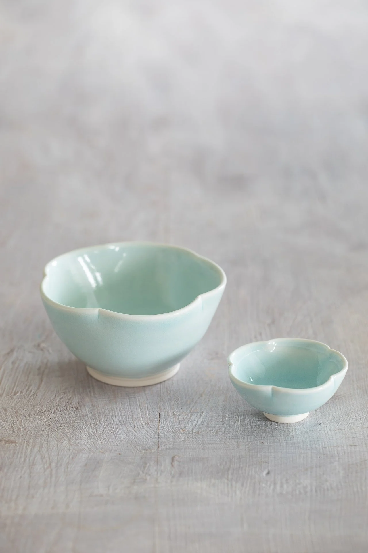 Beautiful hand-thrown ceramic vessels in porcelain clay with colours ...